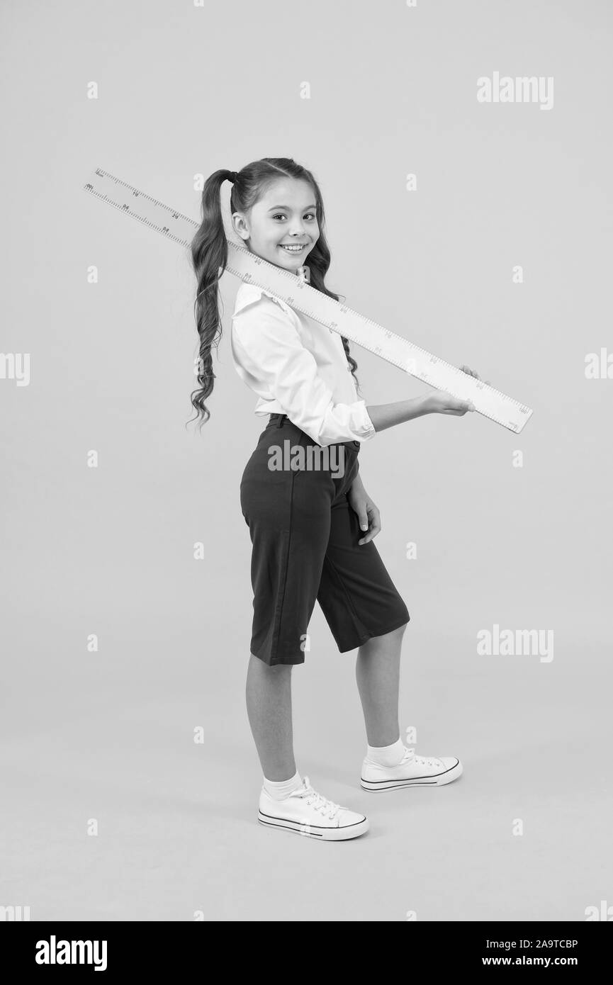 Ruler makes the drawing look better. Small child holding drawing ...