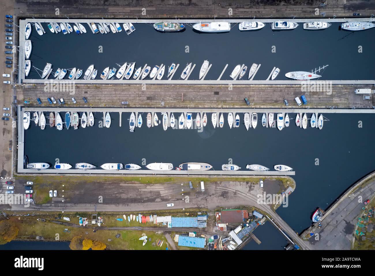 Aerial view of Marina with boats and yachts from above in row and ...