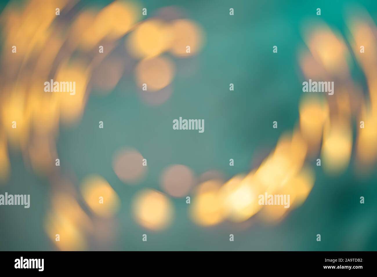 Amber color light patches, defocused background Stock Photo - Alamy