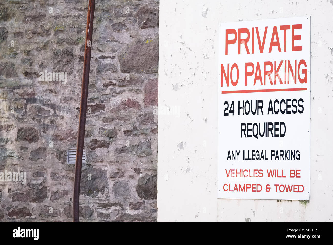 Private no parking 24 hour access required sign Stock Photo - Alamy