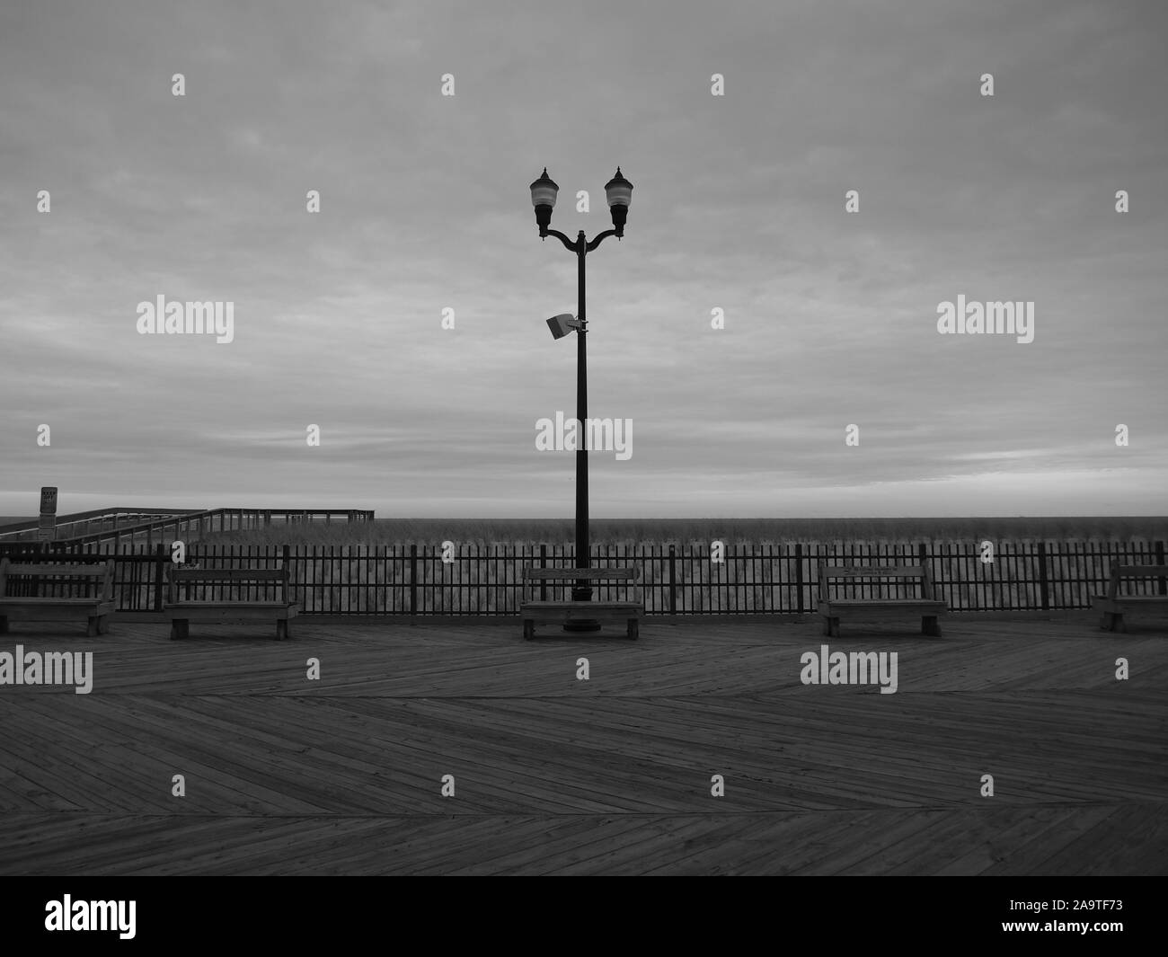 Lone light pole on the Seaside Heights, New Jersey, boardwalk towers ...