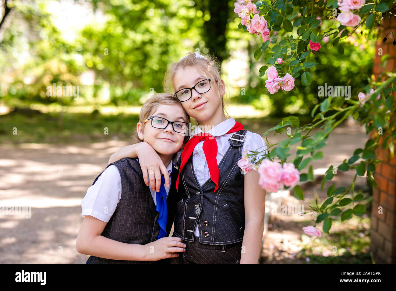 two primary student wearing school uniform. russian elementary school ...