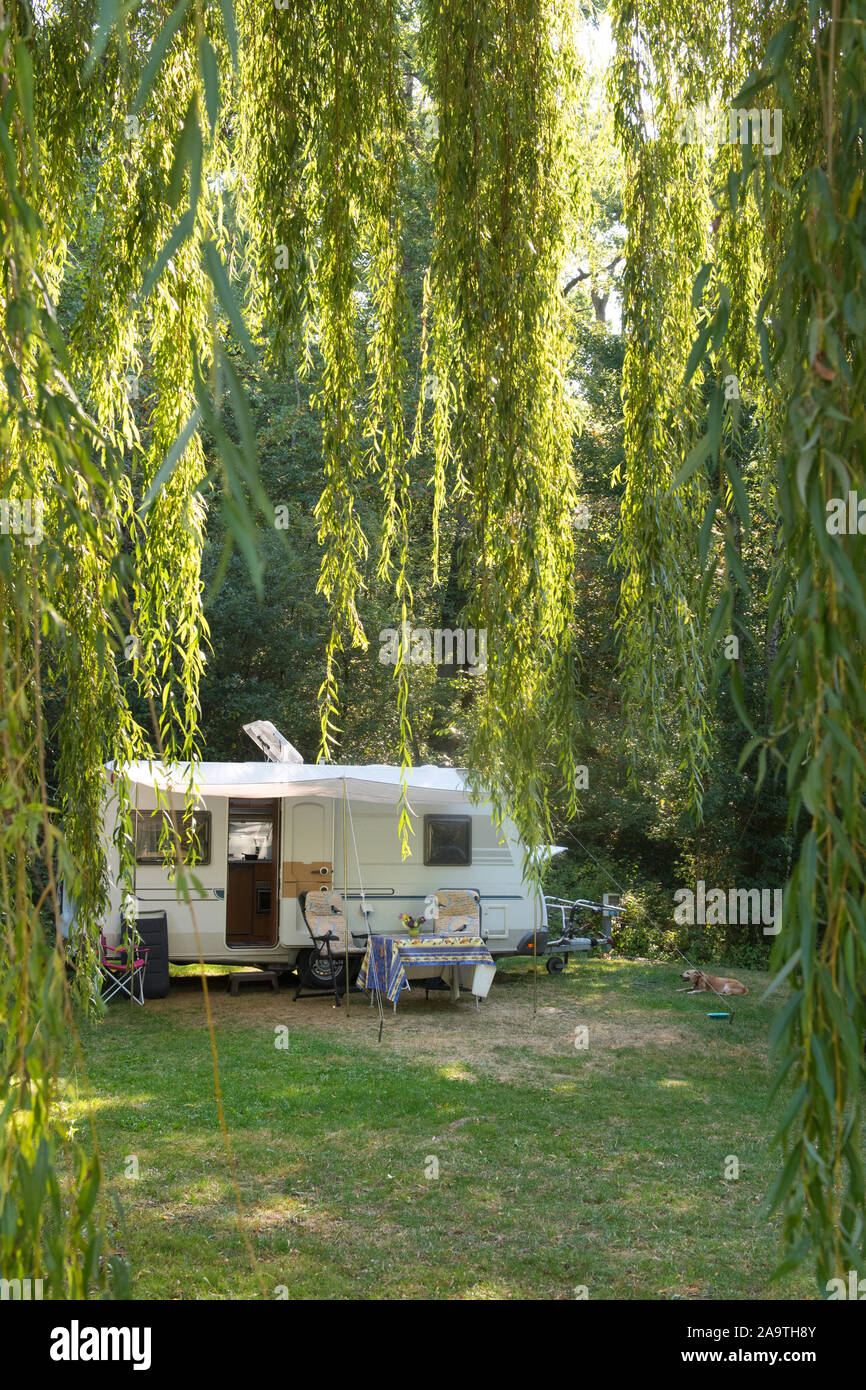 Caravan situated outdoor on campsite Stock Photo - Alamy