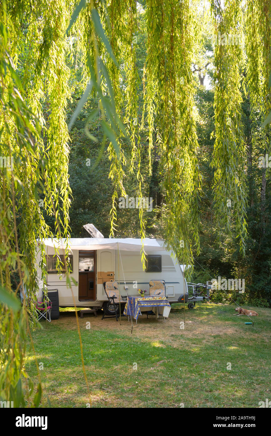 Caravan situated outdoor on campsite Stock Photo - Alamy