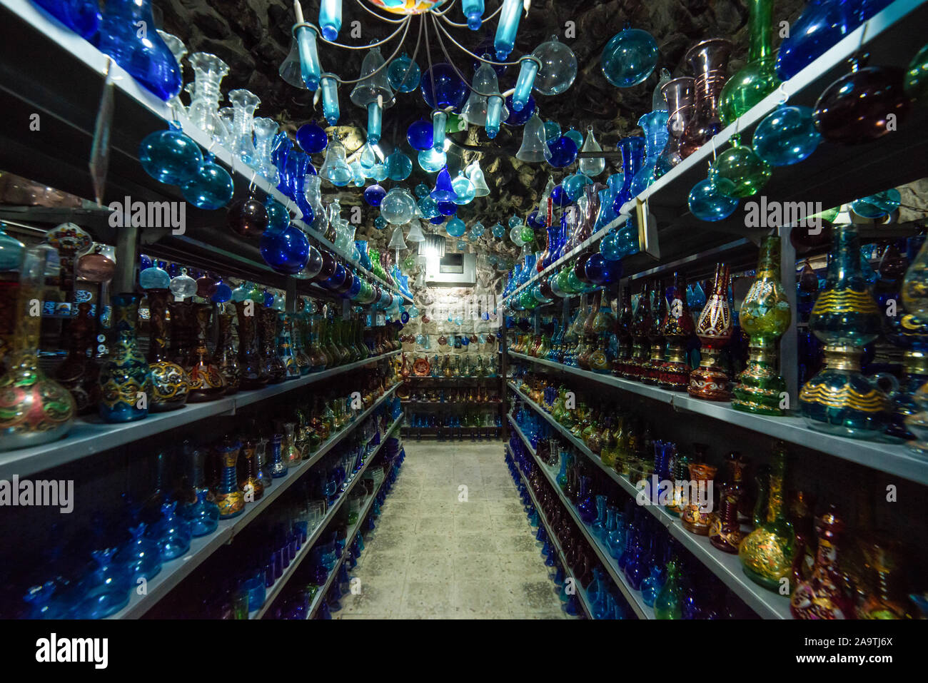 Glassblowing glassblower studio workshop with glass artefacts available ...