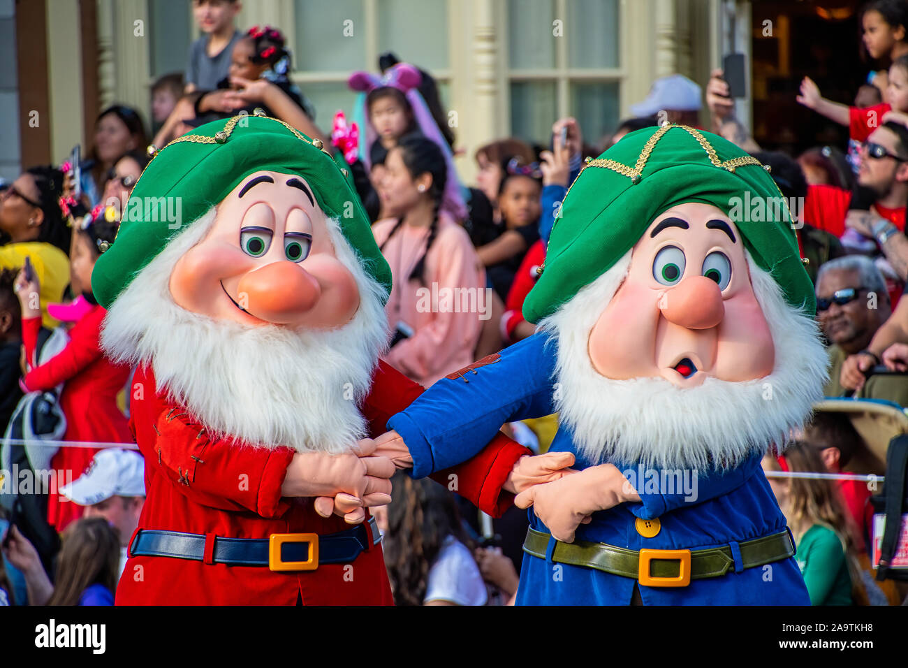 Seven Dwarfs in the Christmastime Parade at Magic Kingdom Stock Photo ...