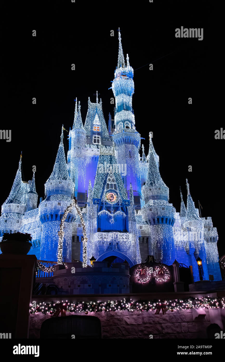 Cinderella Castle at night lit with Christmas lights at the Magic ...