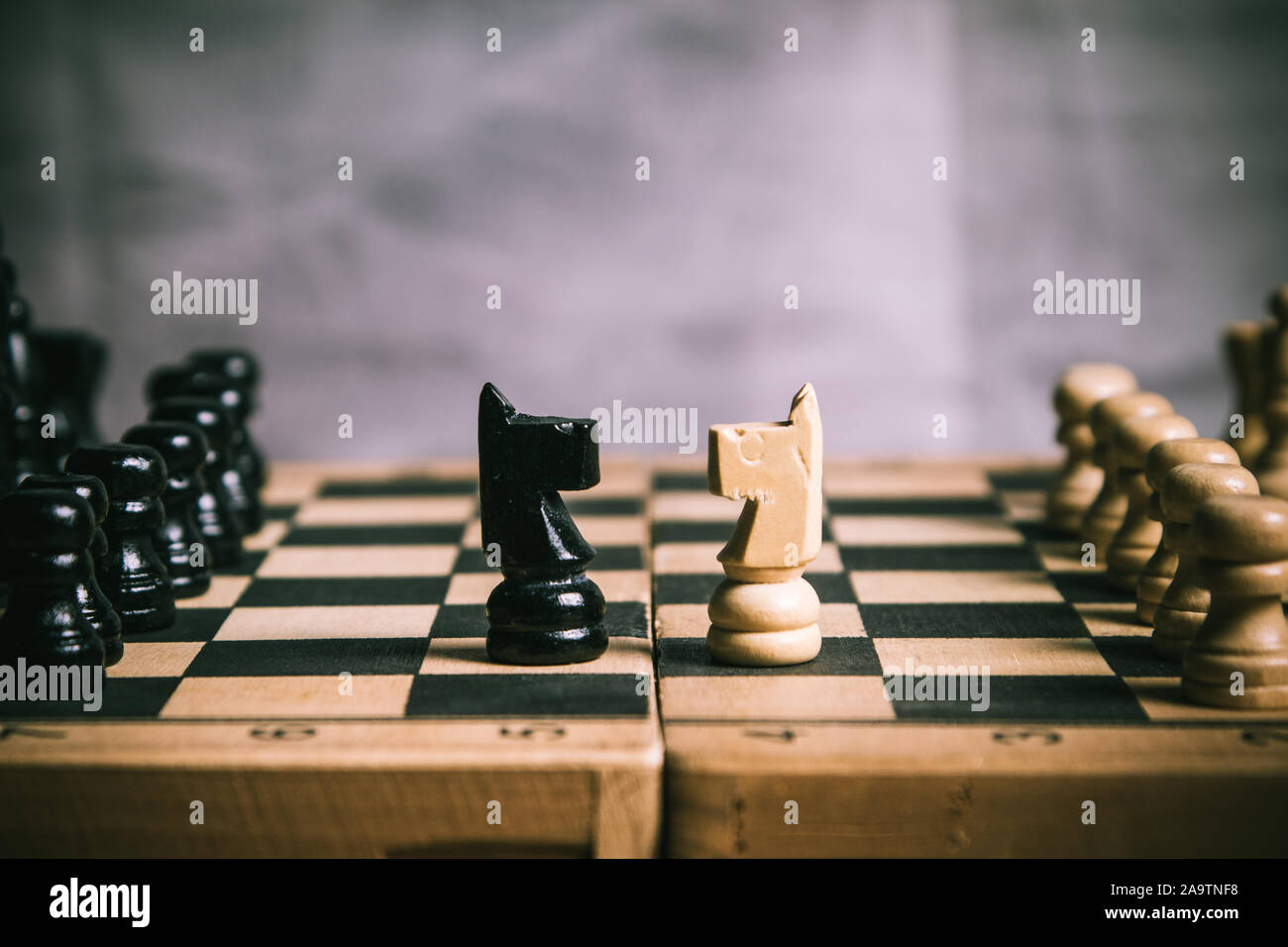 Scene of a chess on a chess wooden board Stock Photo - Alamy