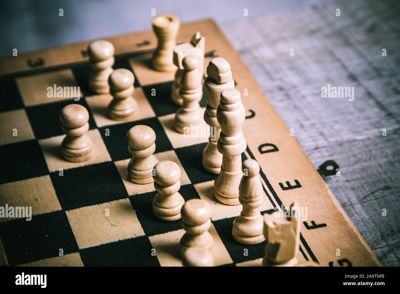 Scene of a white chess figures on a chess board Stock Photo - Alamy