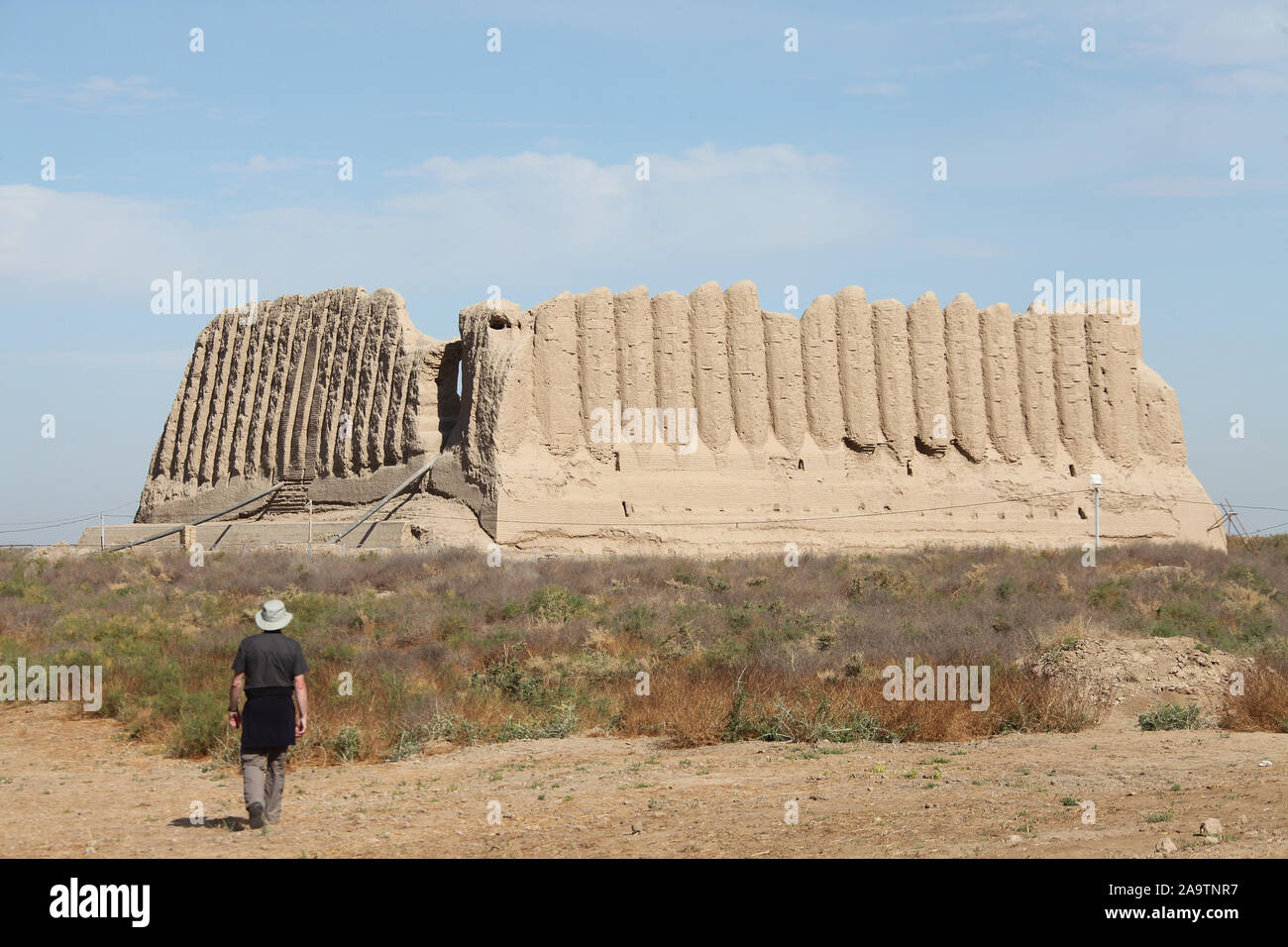 Tourist at Ancient Merv standing by the Great Kyz Kala Stock Photo - Alamy