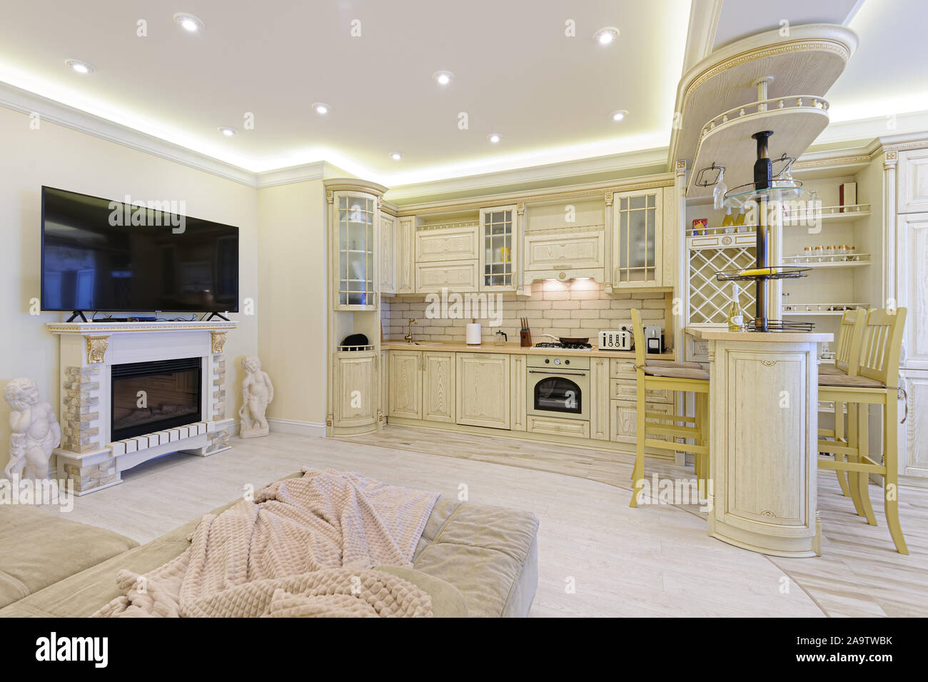 Luxury modern beige kitchen interior Stock Photo - Alamy