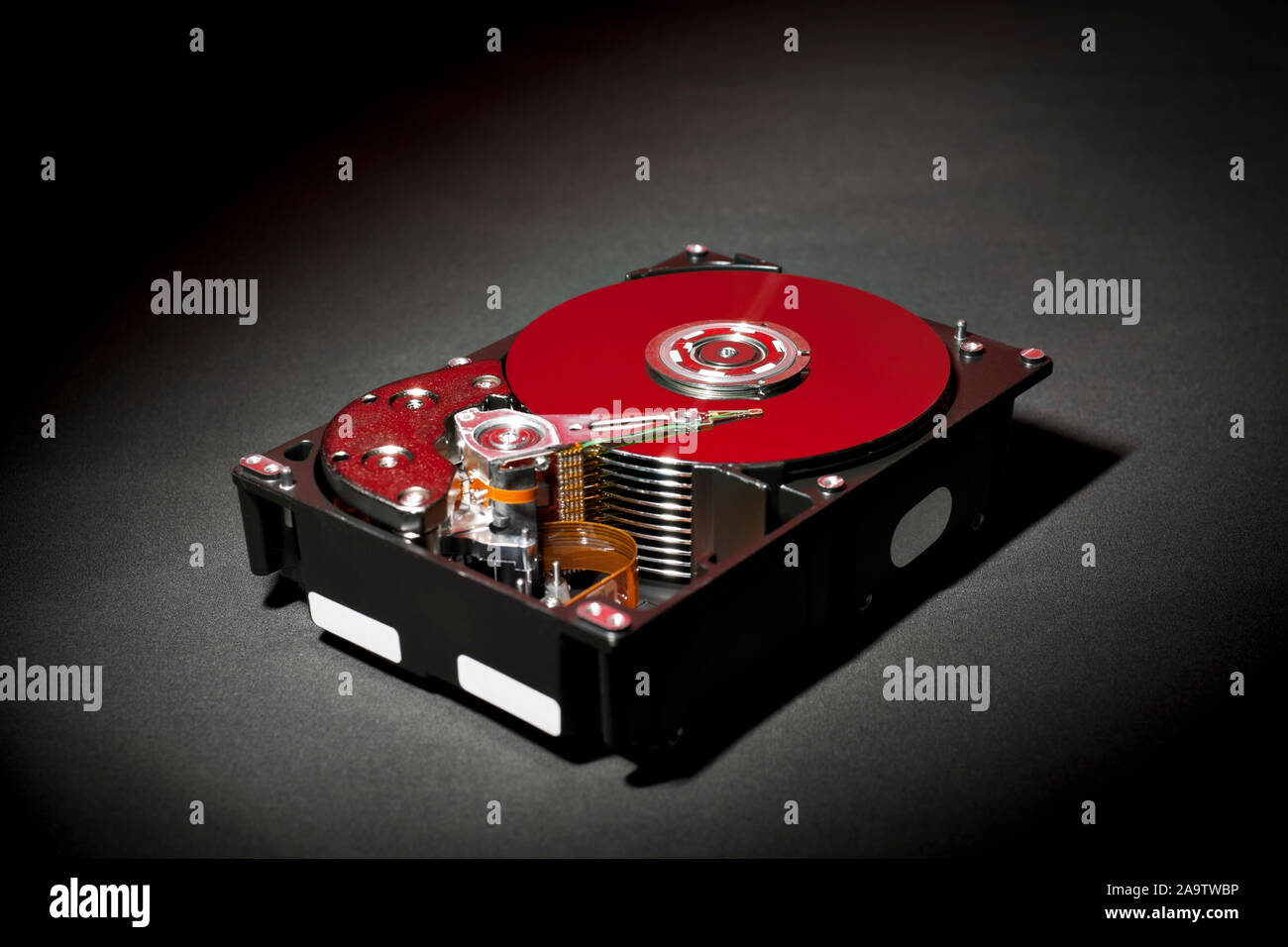 Opened and Exposed Hard Drive Platters in Red Stock Photo - Alamy