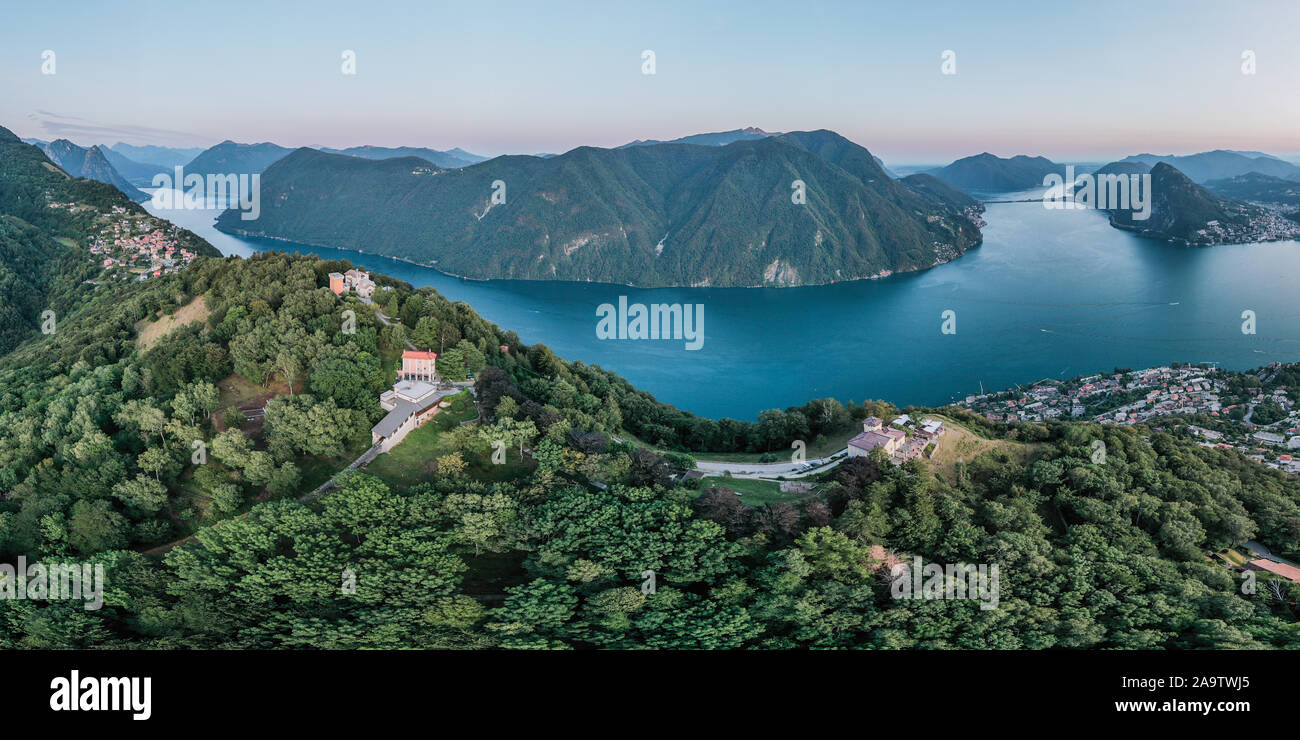 Aerial panorama drone view of lugano lake, monte bre, salvatore and ...