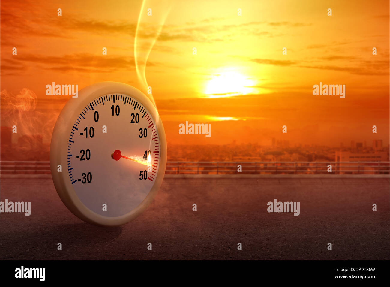 The thermometer on the street with a high temperature on the city with ...