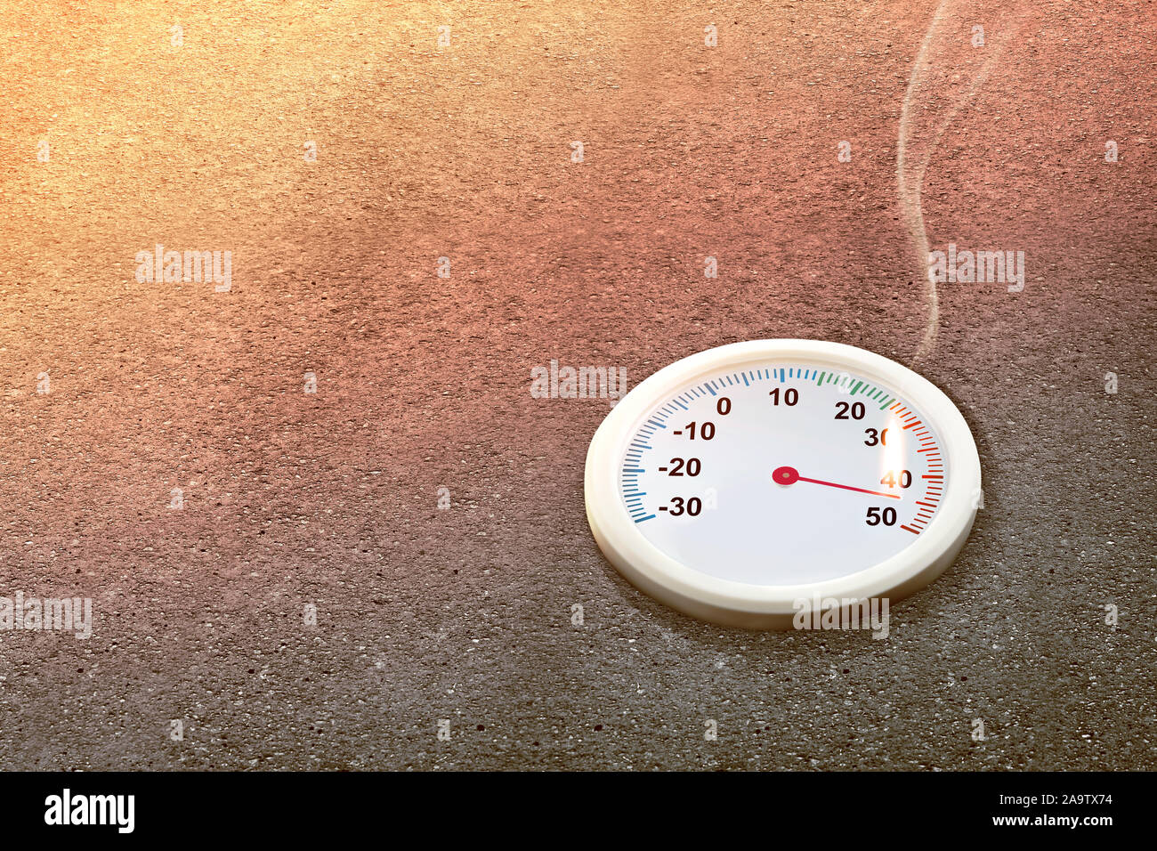 Thermometer with high temperature on the street with glowing sun ...