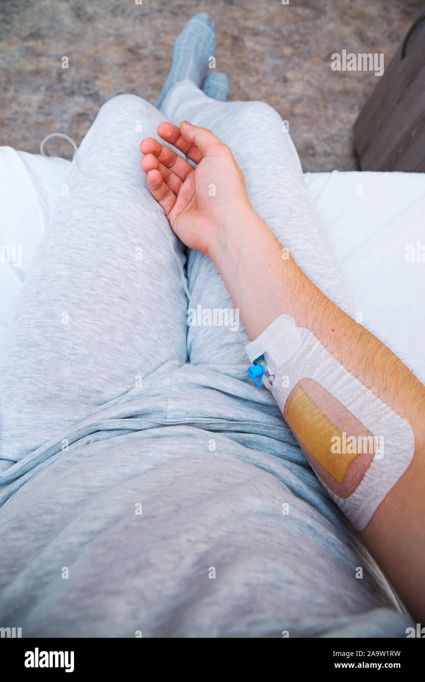 Infusion catheter catheter in patients hand. First person view Stock ...