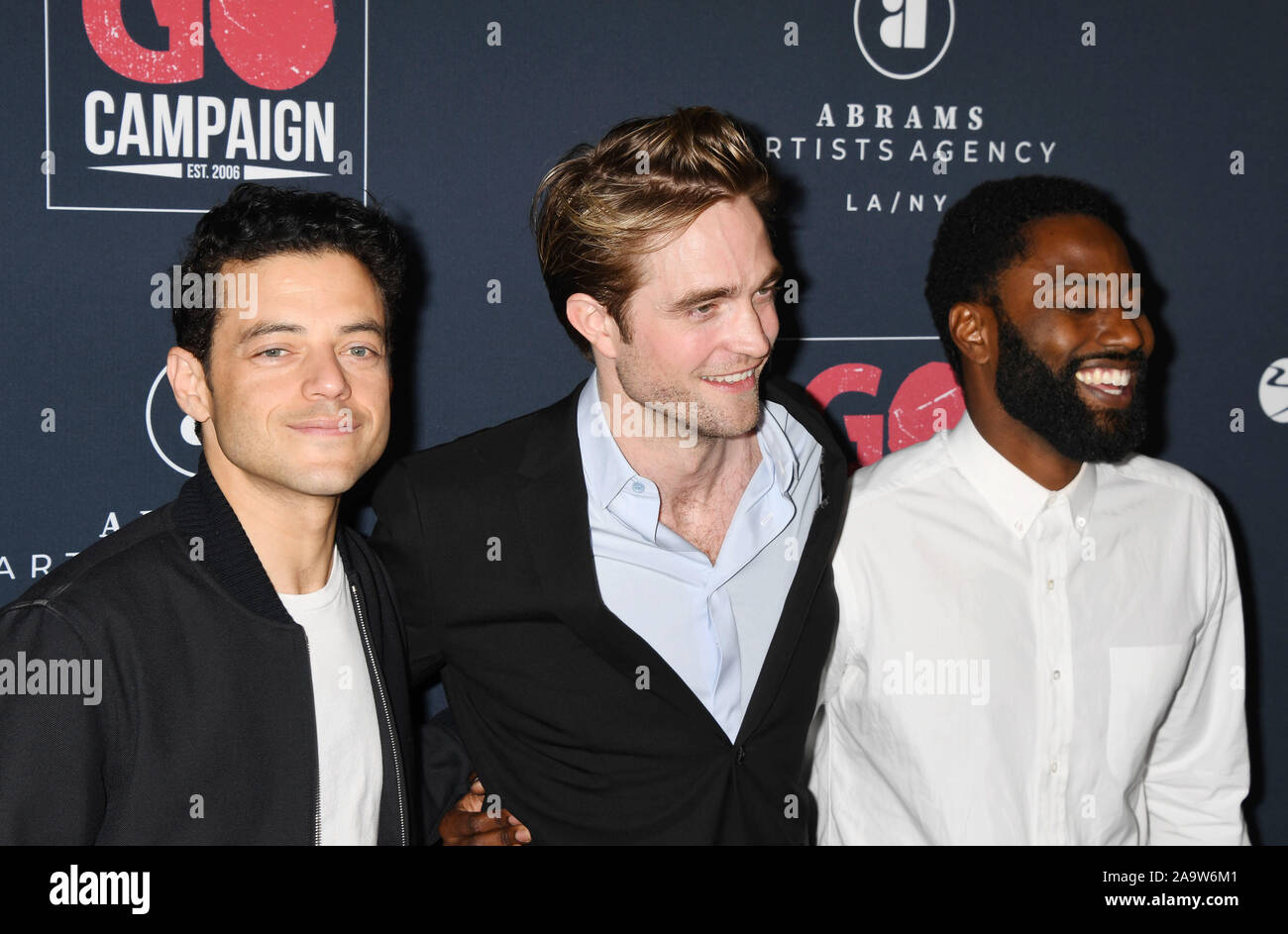 HOLLYWOOD, CA - NOVEMBER 16: (L-R) Rami Malek, Robert Pattinson and ...