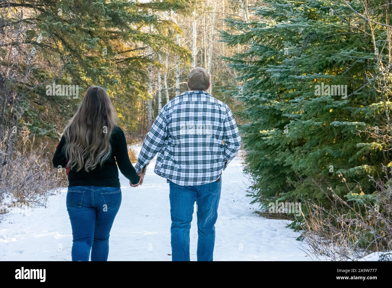 Family walking along in outdoor setting hi-res stock photography and ...