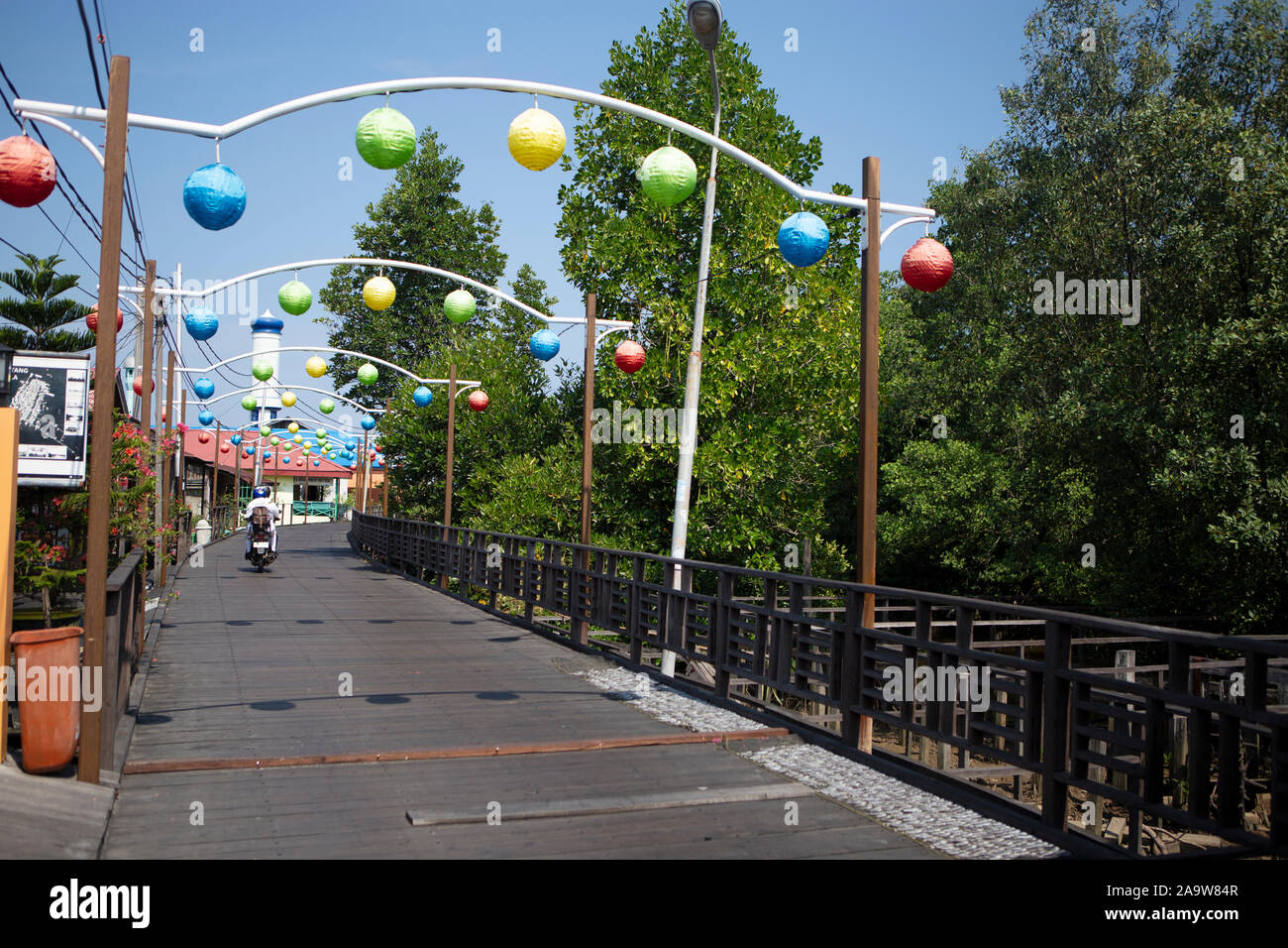 wooden bridge at bontang Koala Village, Botang, surrounded mangrove ...