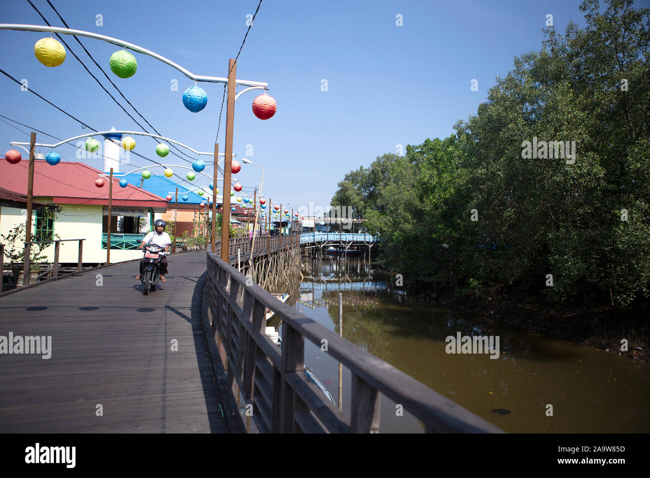 wooden bridge at bontang Koala Village, Botang, surrounded mangrove ...