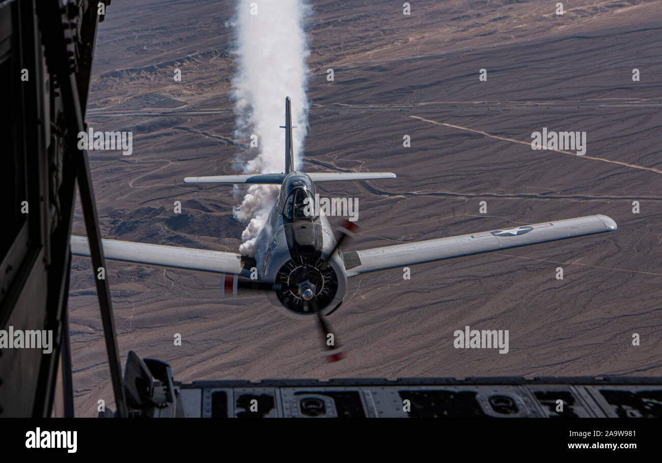 A U.S. Marine Corps T-28 Trojan aircraft, pops smoke over Nellis Air ...