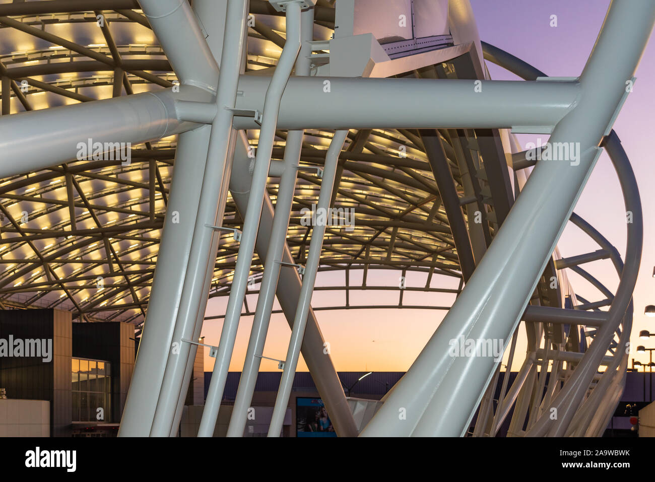 Detail of new HOK designed rolled-steel lighted canopy with translucent ...