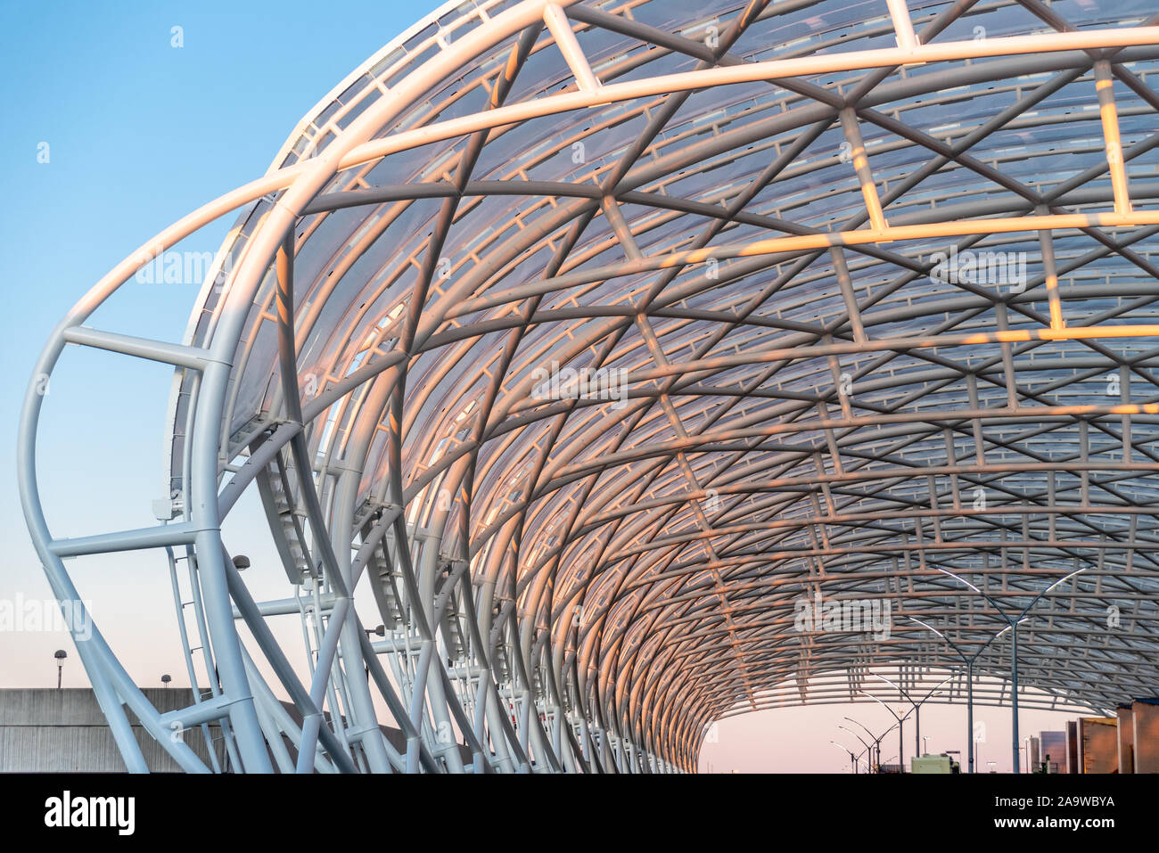 Sunrise view of HOK designed contemporary rolled-steel canopy with ...