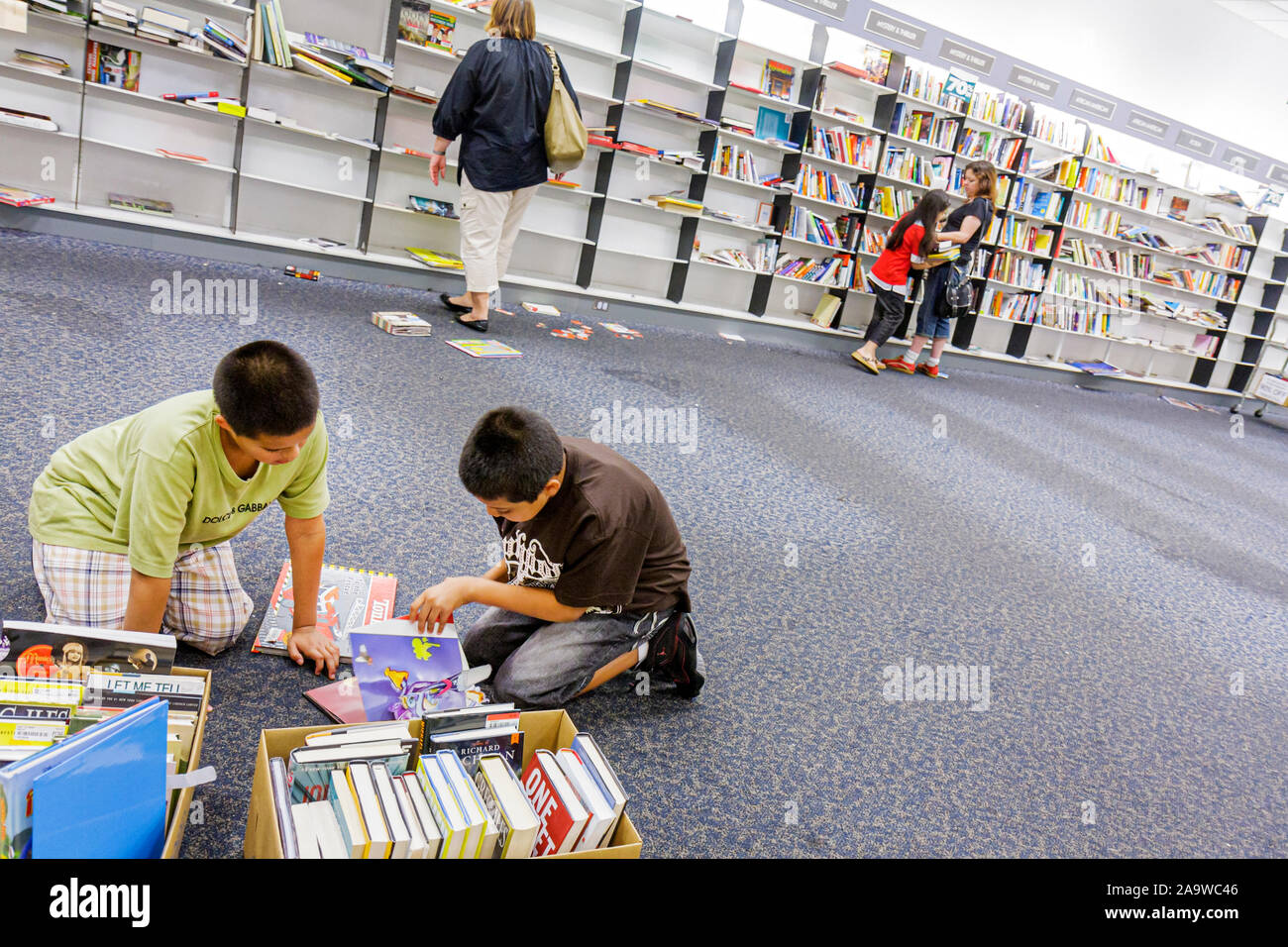 Boy closing book hi-res stock photography and images - Alamy