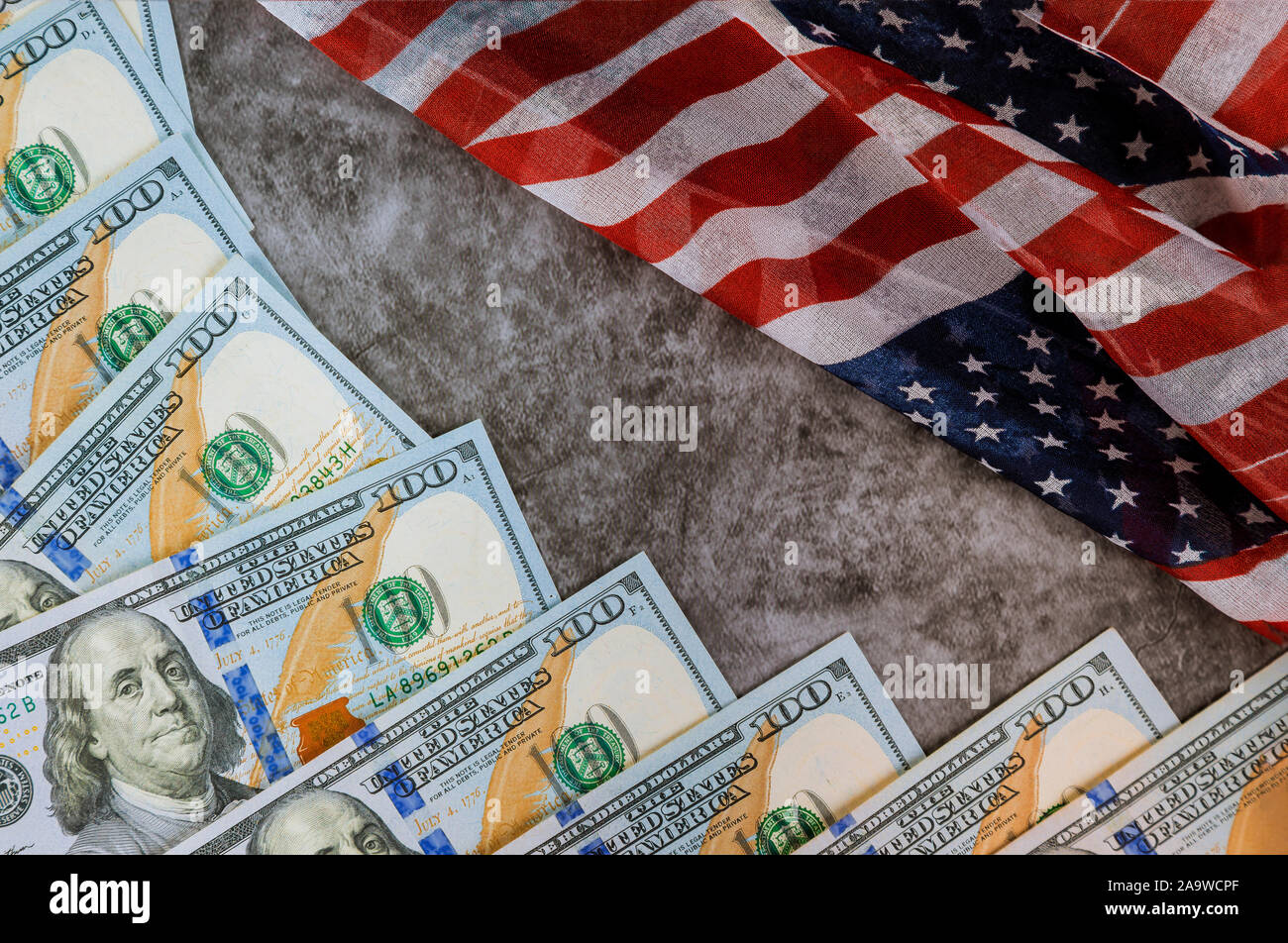 American flag and banknotes 100 USA dollar bill in the USA financial ...