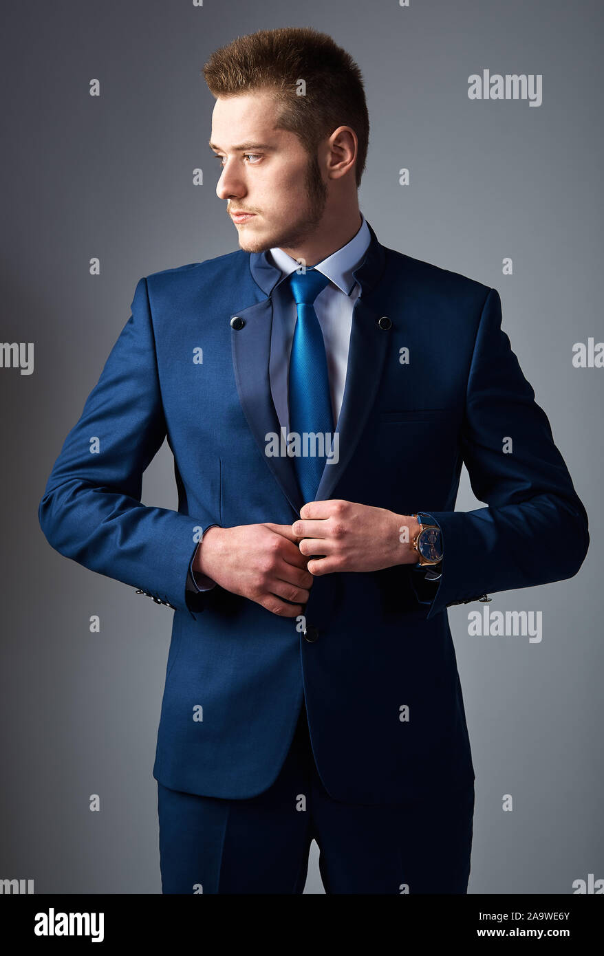 Businessman adjusting cuffs hi-res stock photography and images - Alamy