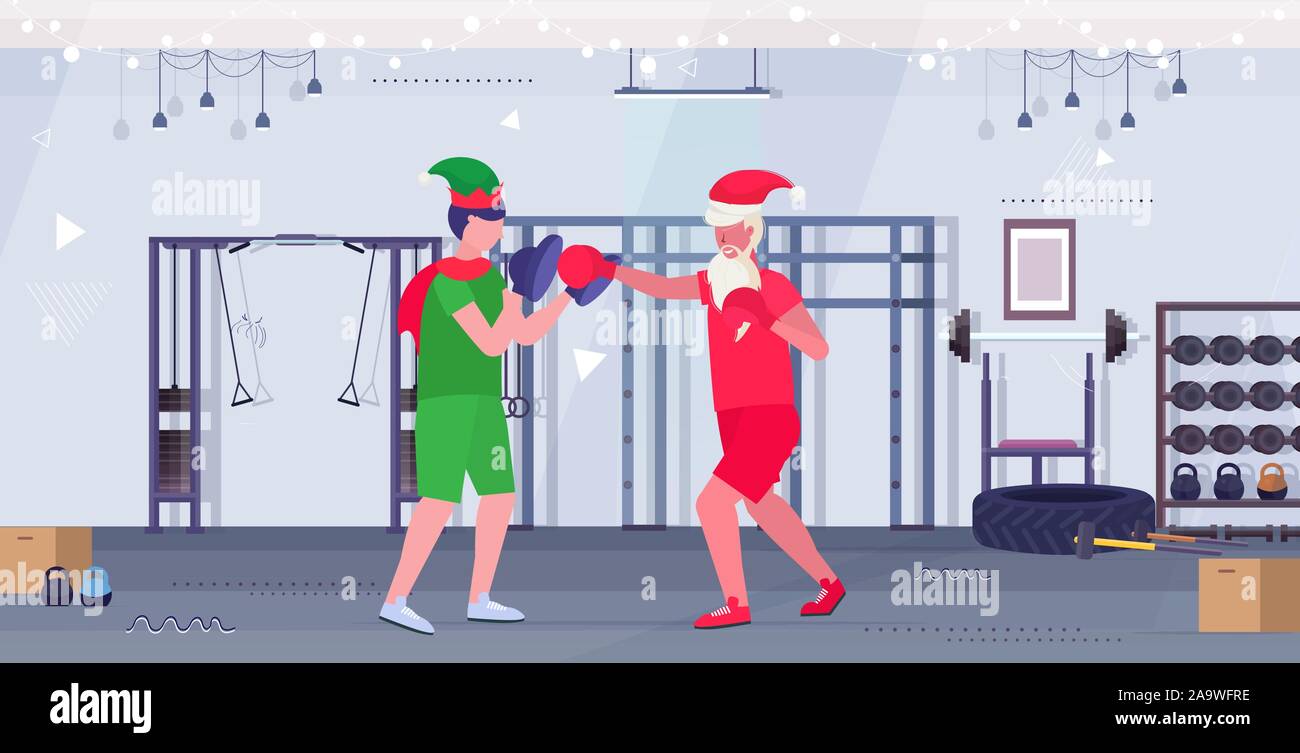 santa claus boxer practicing boxing exercises with elf helper workout ...