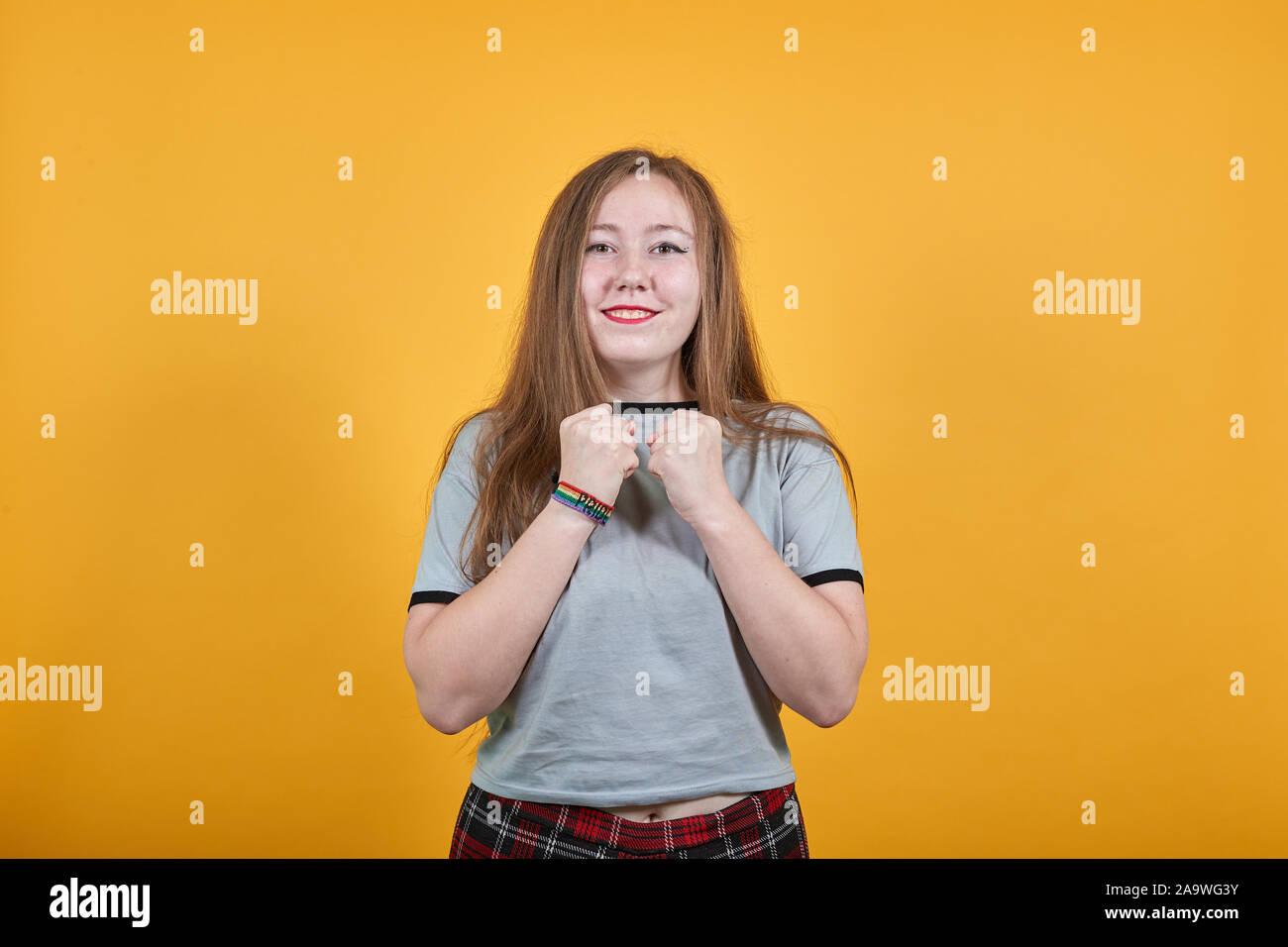 Woman fist chest isolated hi-res stock photography and images - Alamy
