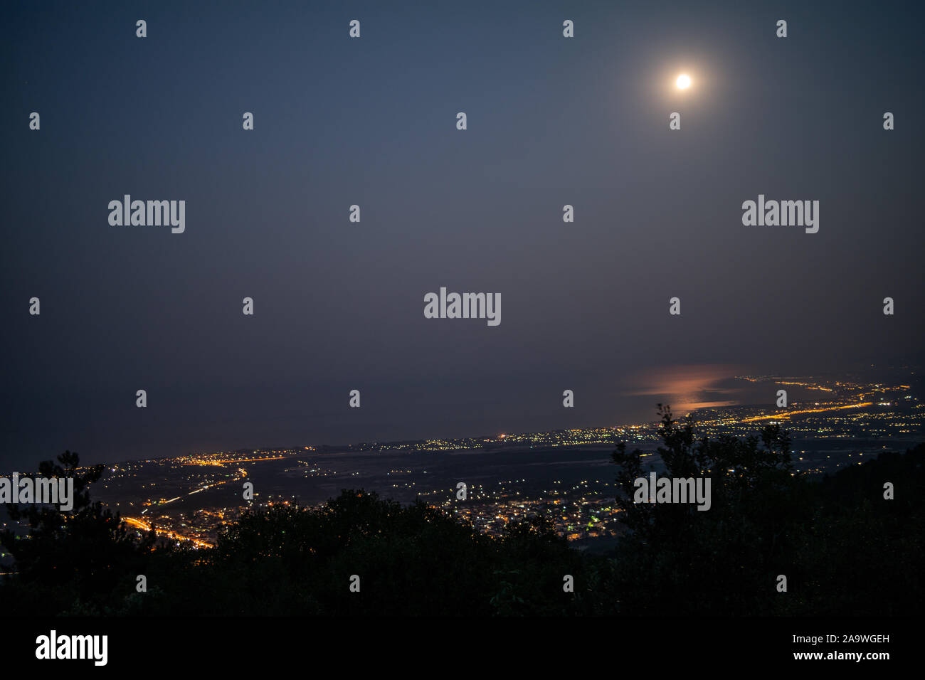 Katerini city before sunset at winter season from a hill side of ...