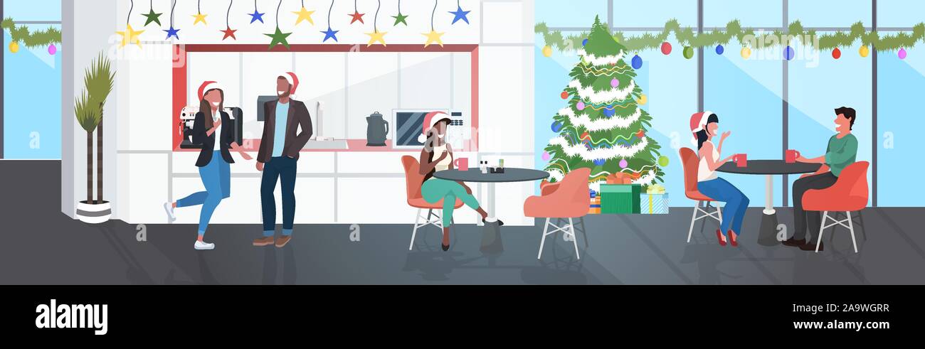 businesspoeple in santa hats having corporate party mix race business ...