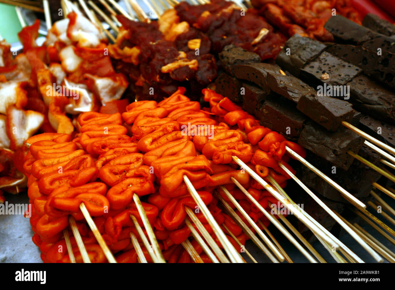 Photo of raw assorted chicken and pork innards sold as street food ...