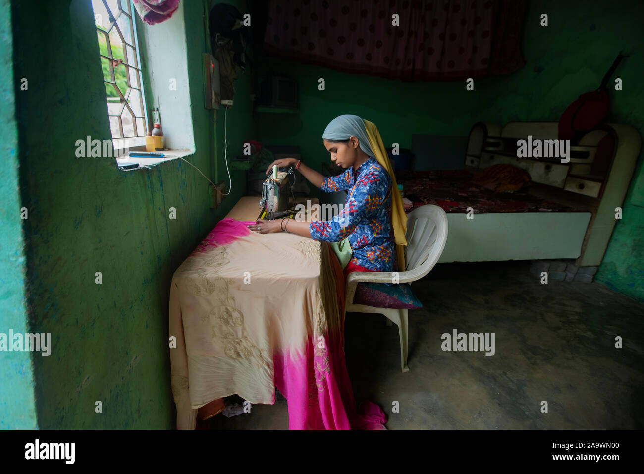 Girl stitching hi-res stock photography and images - Alamy