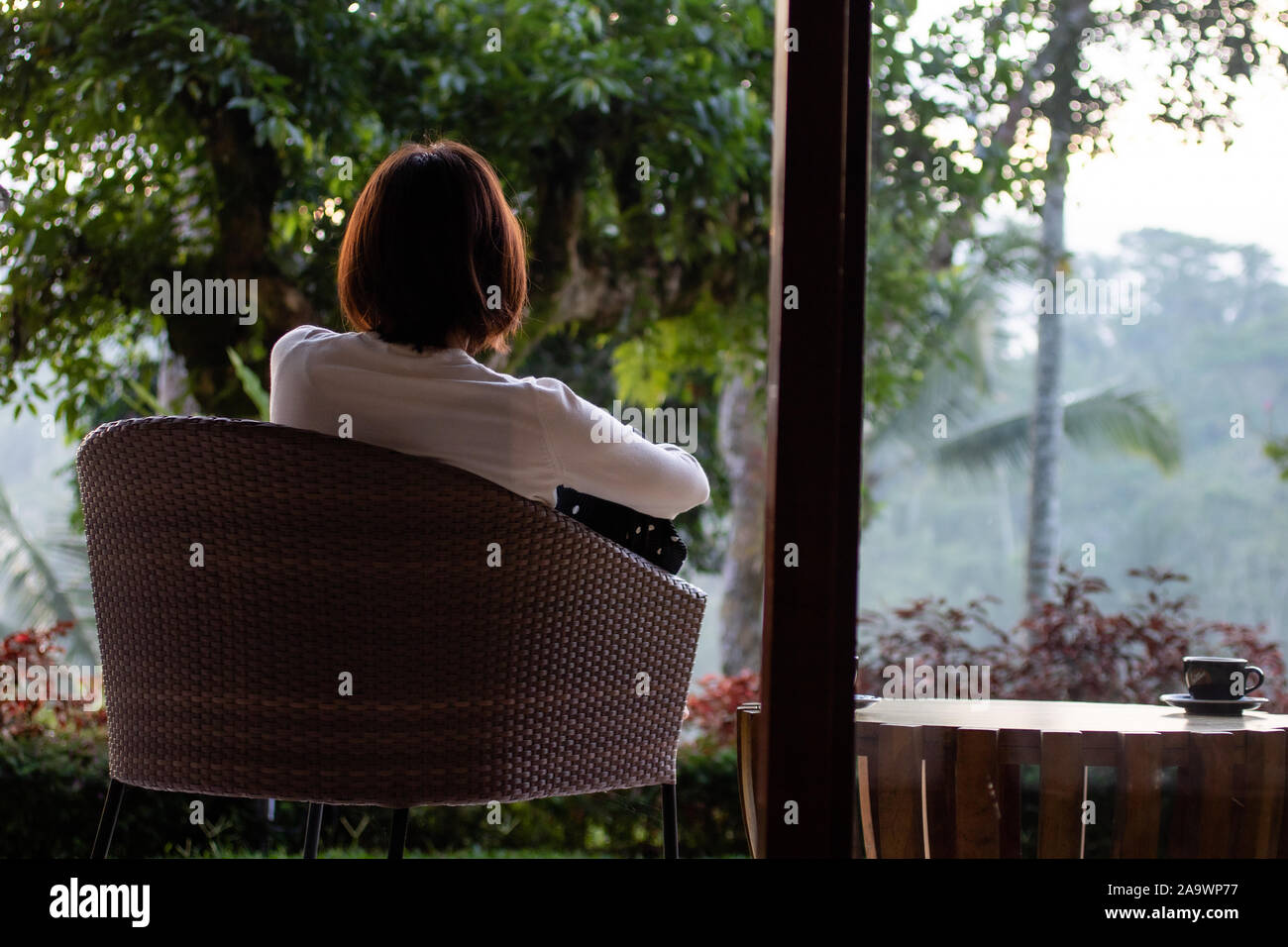 A beautiful young woman drnking tea and relaxing in the morning Stock ...