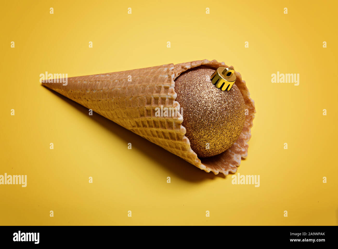 Golden waffle ice cream cone hi-res stock photography and images - Alamy