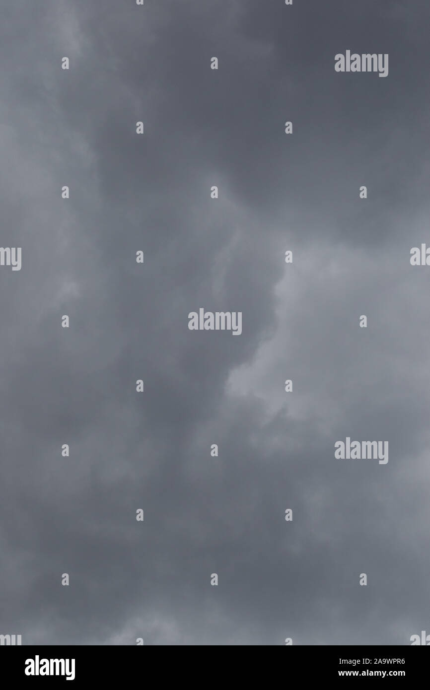 Grey threatening thunder storm clouds image for background use with ...