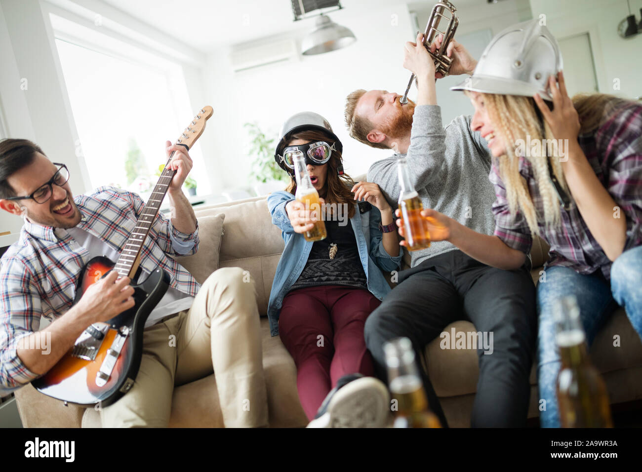 Group of friends having fun together, talking, laughing and enjoying ...