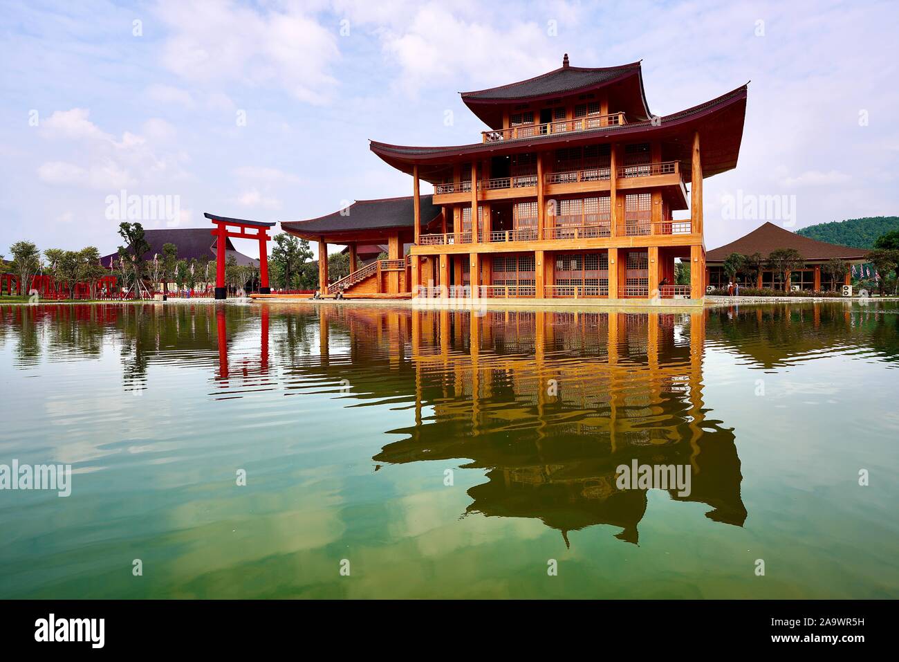 Reflection of Japanese style wooden castle Stock Photo - Alamy