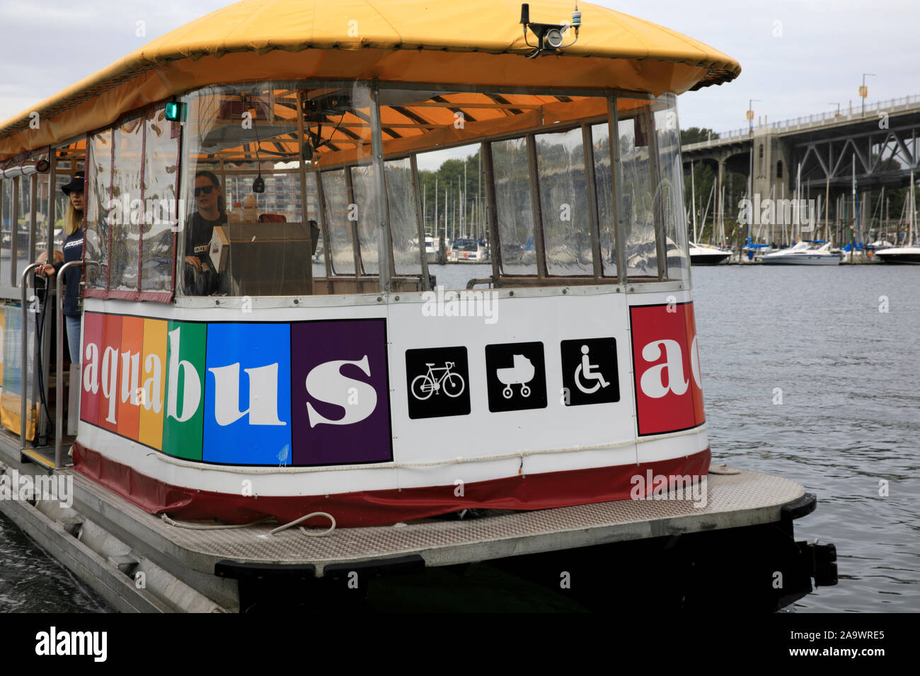 Aquabus at False Creek Bay alongside the Granville street bridge ...