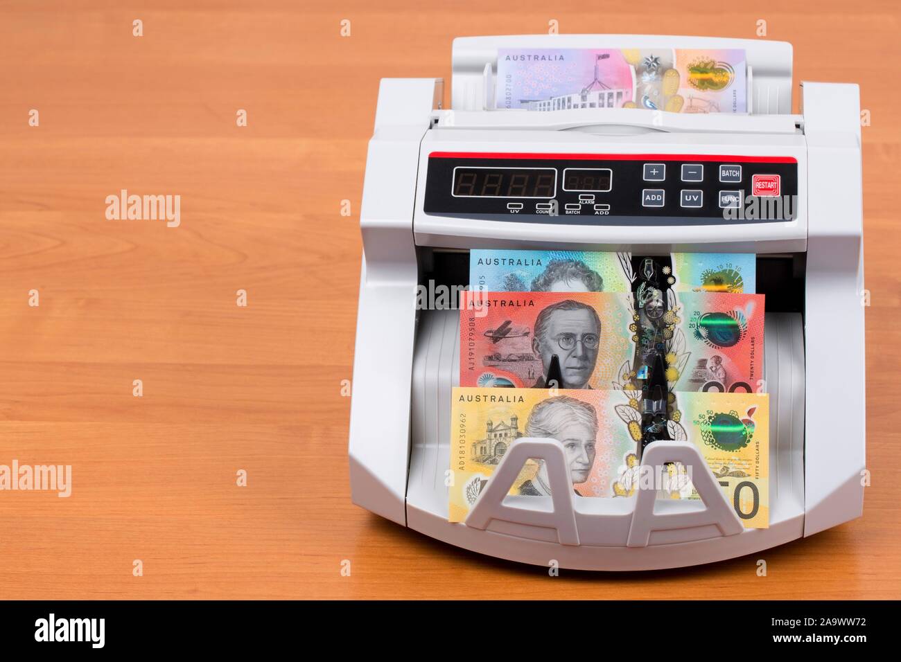 Australian money in a counting machine Stock Photo - Alamy