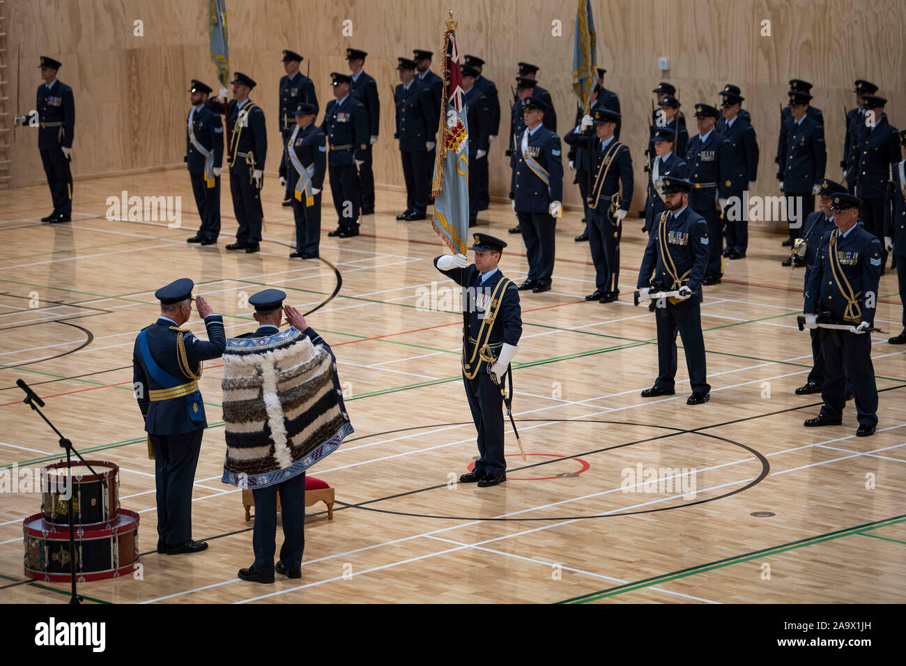 The Prince of Wales presents the new Queen's colours during a ceremony ...
