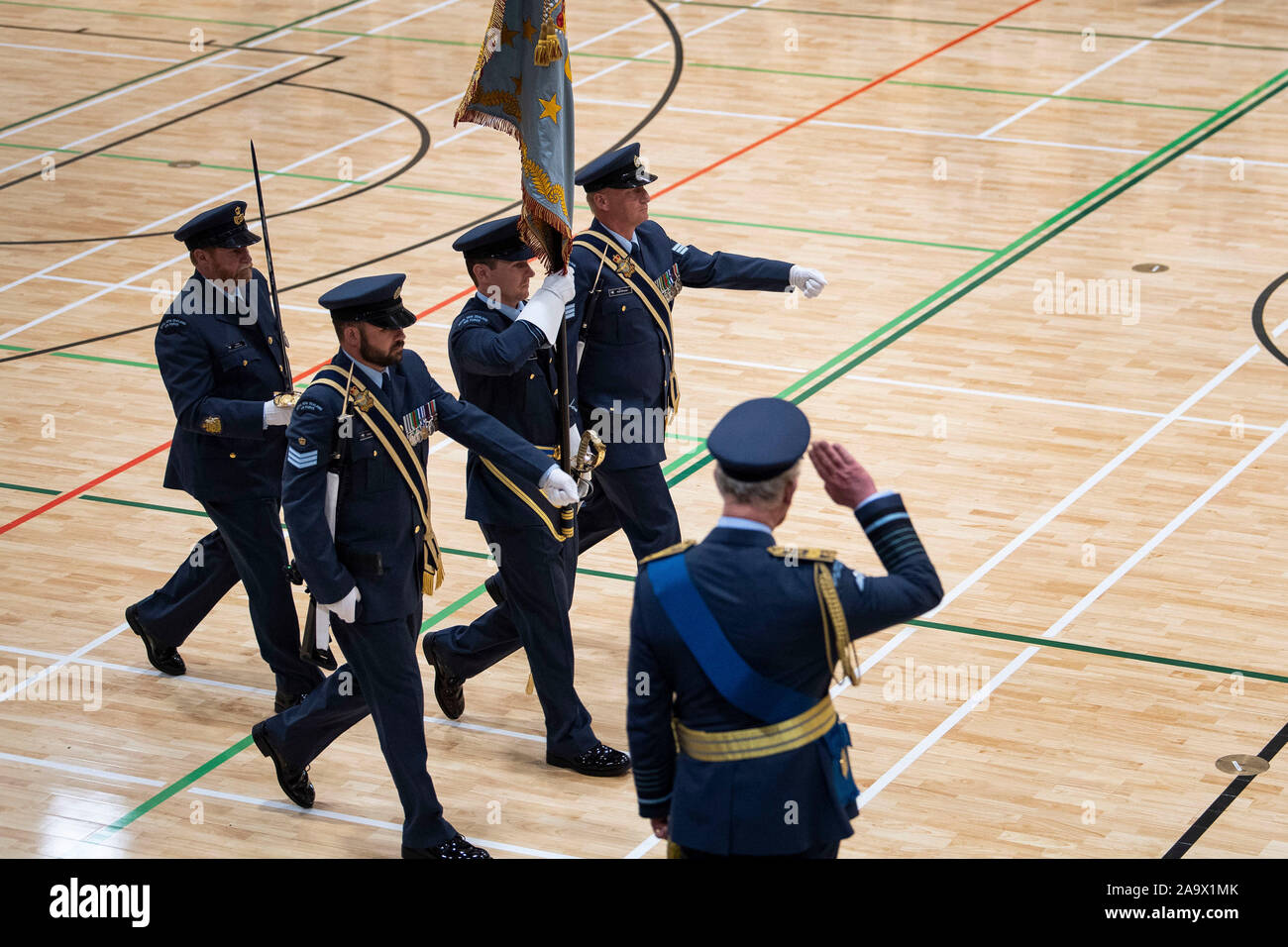 The Prince of Wales presents the new Queen's colours during a ceremony ...
