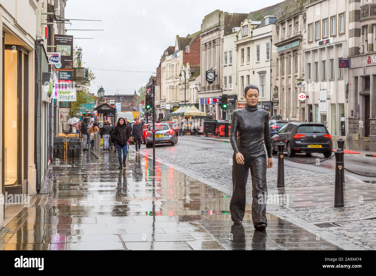 The eye catching Walking Woman bronze statue by sculptor Sean Henry ...