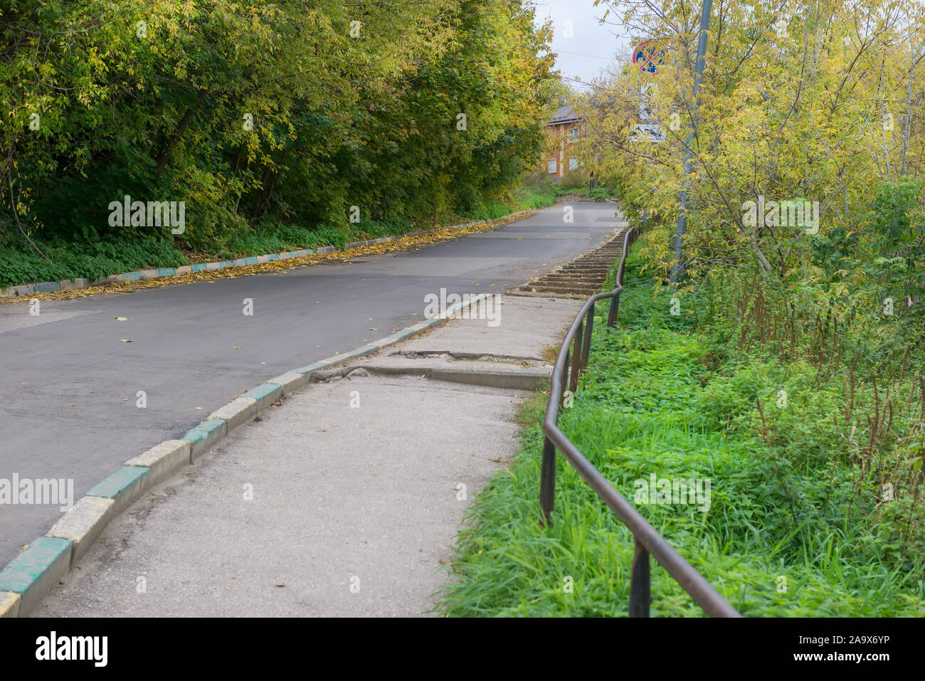 Steep road - climb from Pechersky Ascension Monastery to the city Stock ...