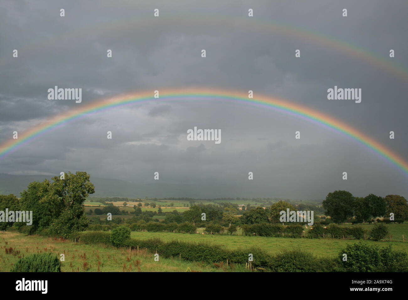 Rainbow weather colours rain sky hi-res stock photography and images ...