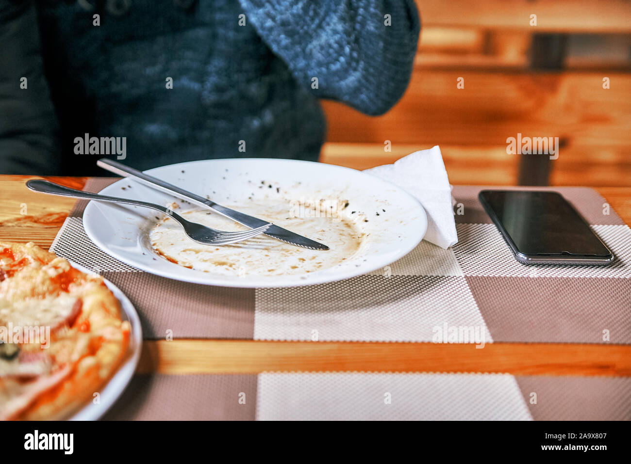 plates and dishes after eating Stock Photo - Alamy