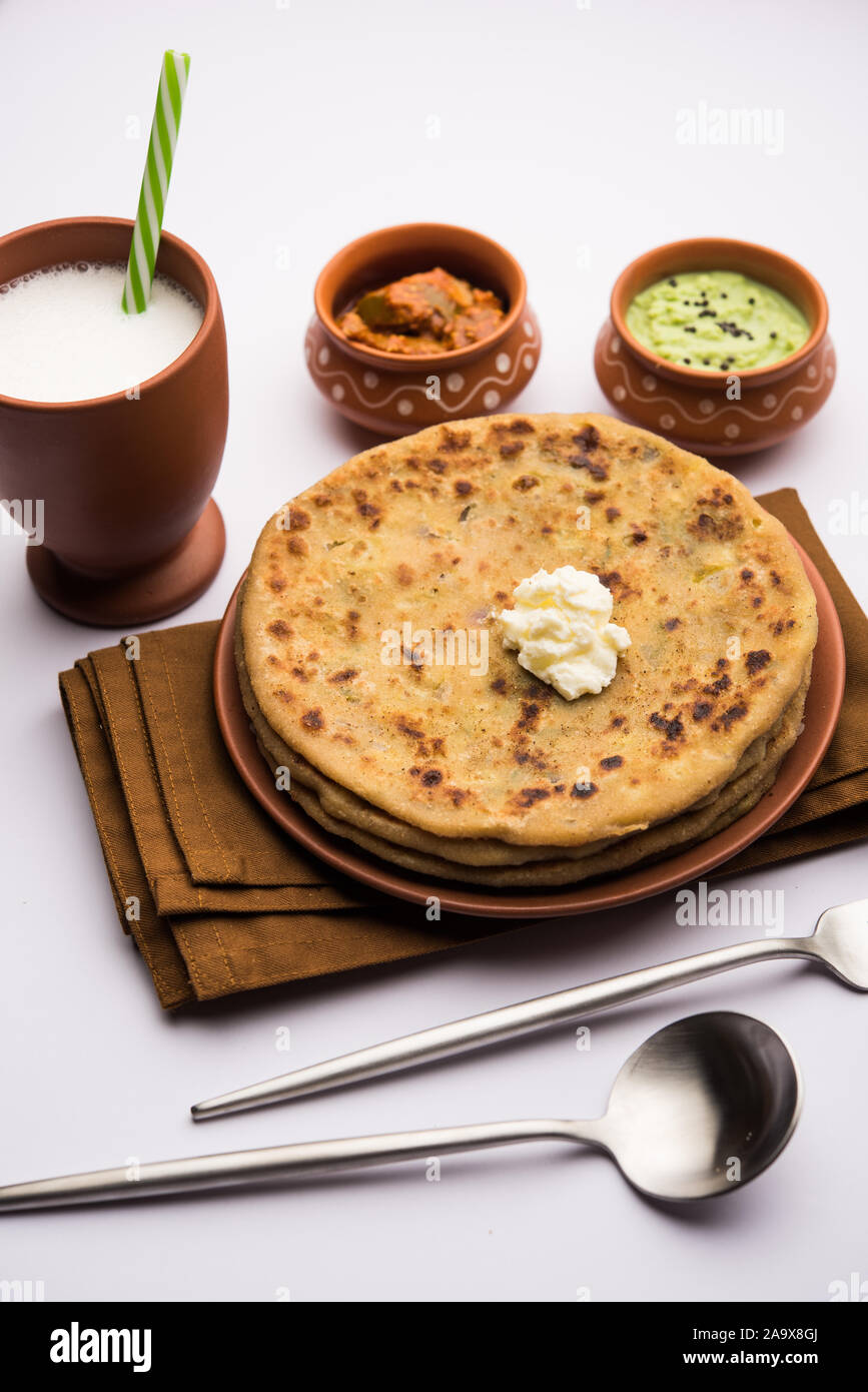 Aloo Paratha / Indian Potato stuffed Flatbread with butter on top ...